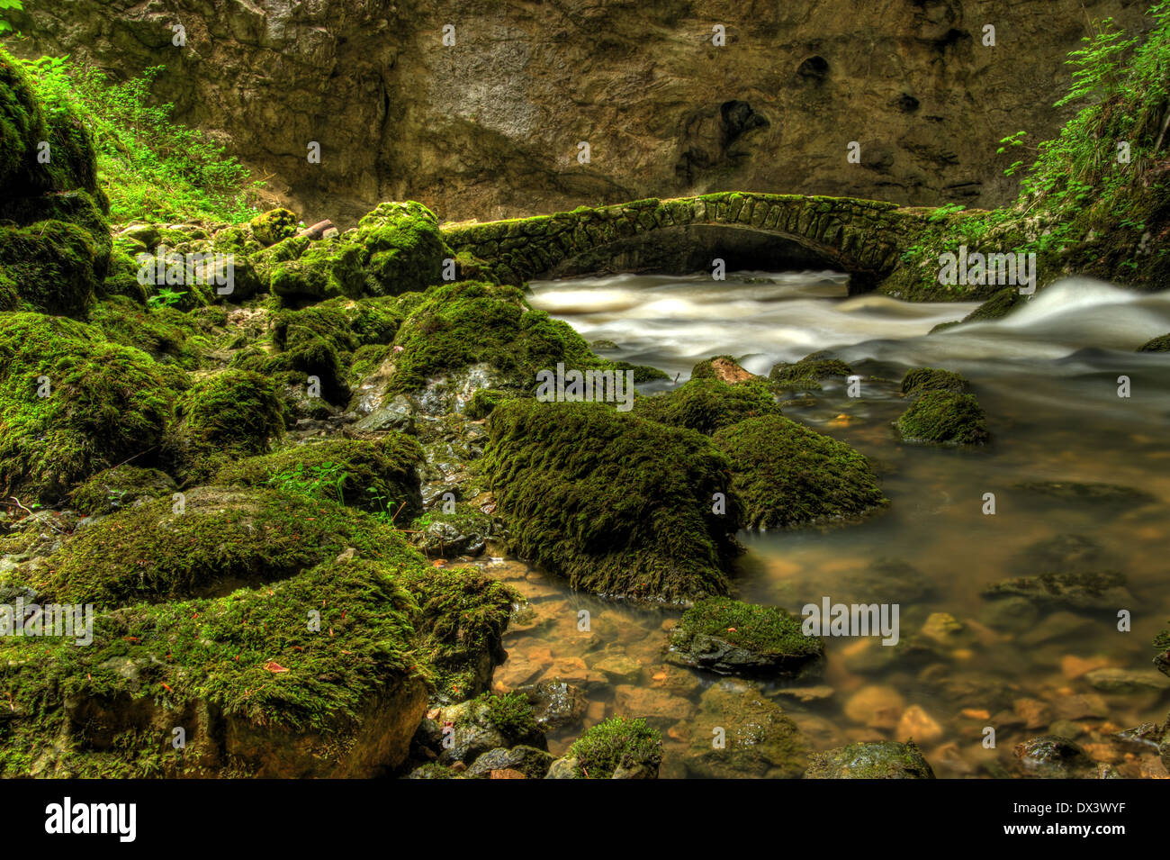 River flow through a cave on slovenian carst Stock Photo - Alamy