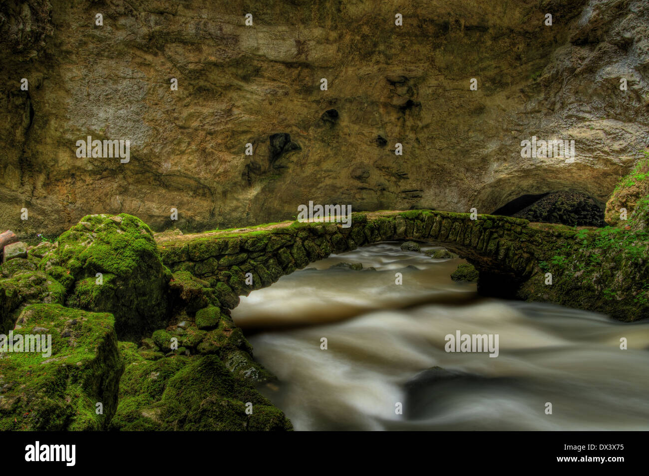 River flow through a cave on slovenian carst Stock Photo - Alamy