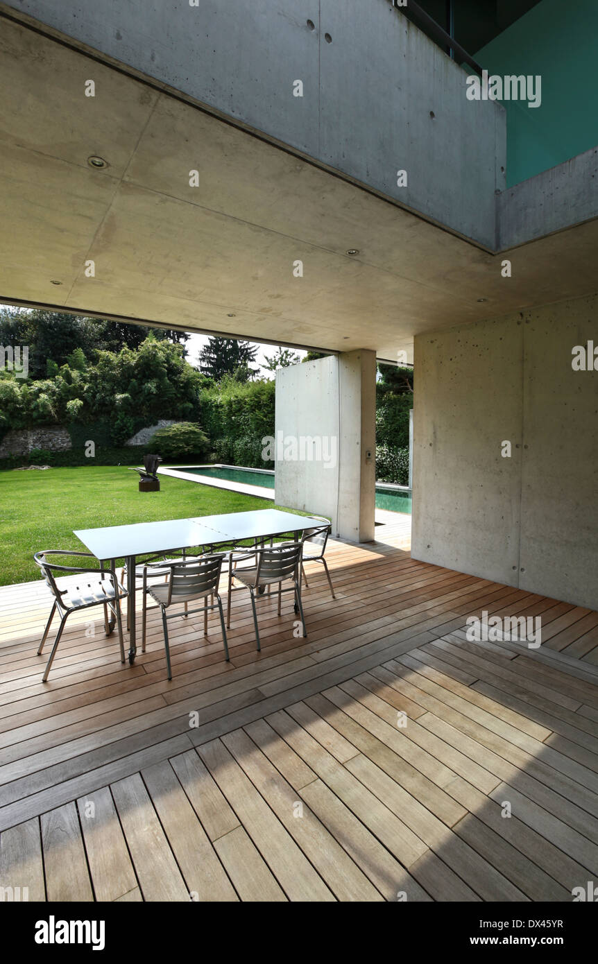 Veranda of a modern house with a beauty pool Stock Photo - Alamy