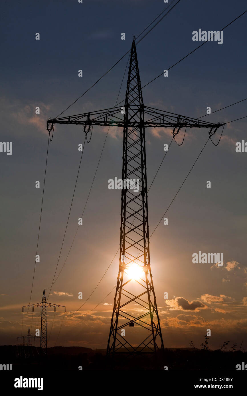 Power poles against sunset hi-res stock photography and images - Alamy