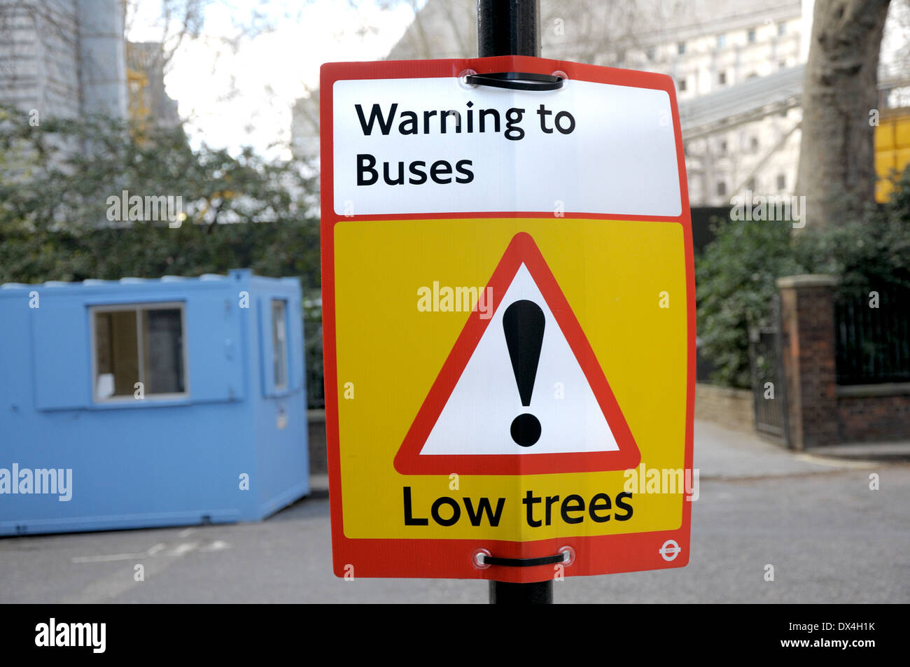 London, England, UK. Warning to double-decker buses sign - 'Low Trees ...