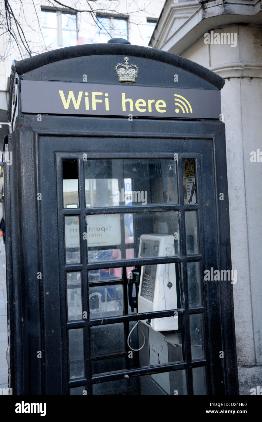 London, England, UK. Repainted traditional telephone box offering WiFi ...