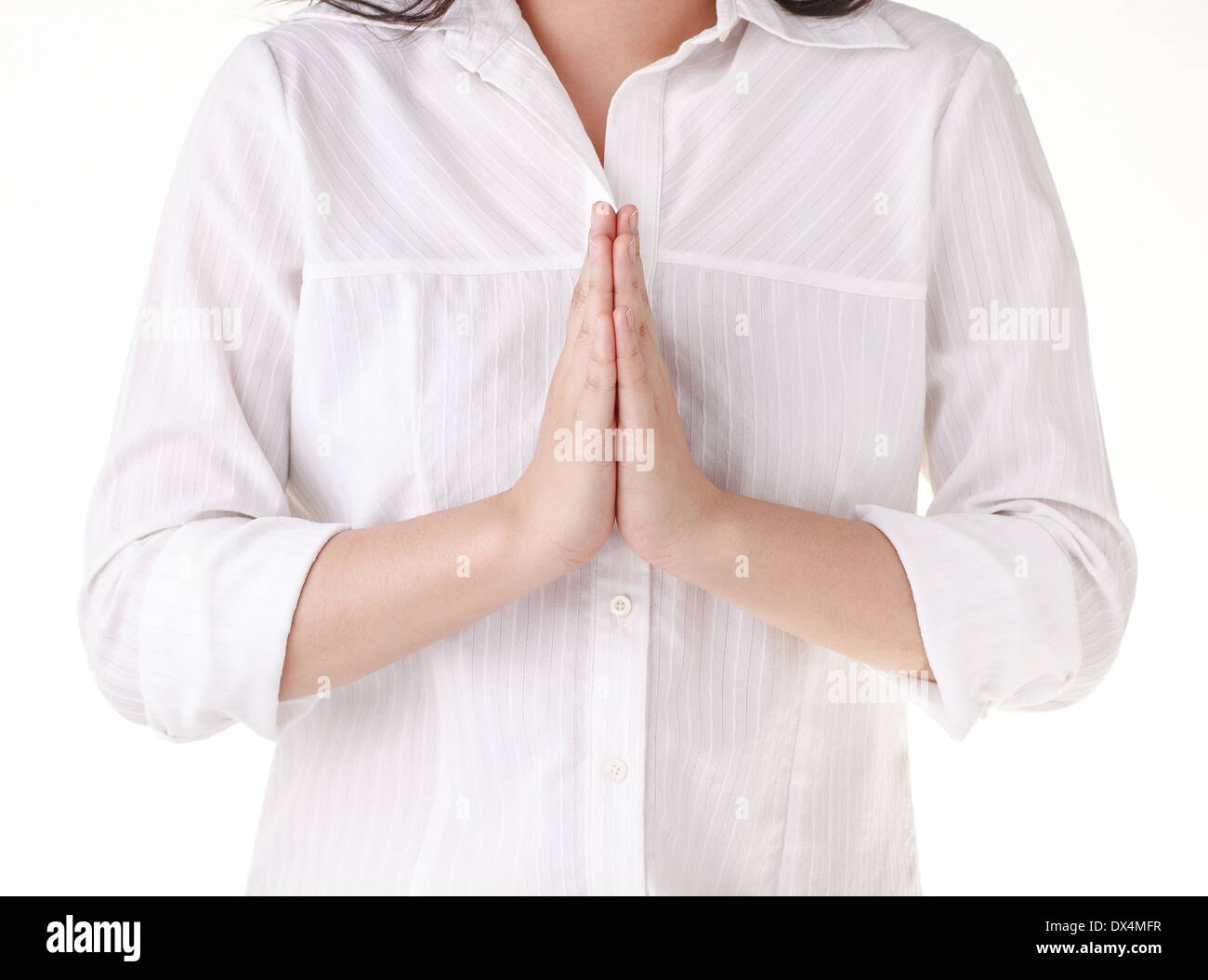 Woman praying isolated on white background Stock Photo - Alamy