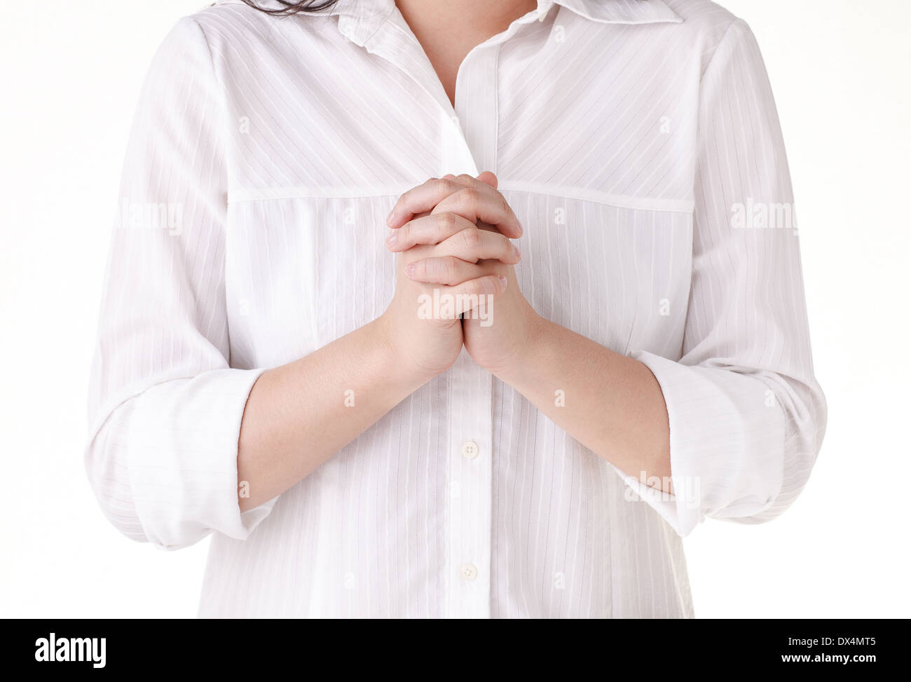 Woman praying isolated on white background Stock Photo - Alamy