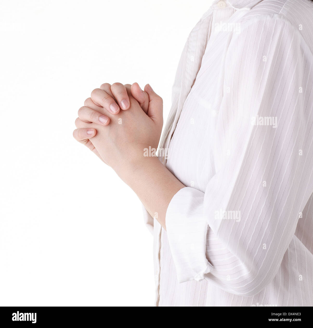 Woman praying isolated on white background Stock Photo - Alamy