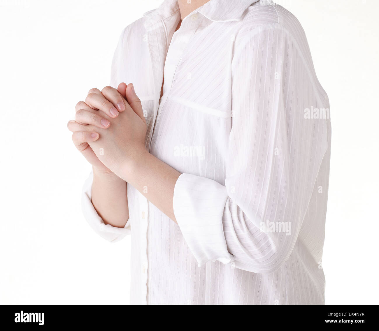 Woman praying isolated on white background Stock Photo - Alamy
