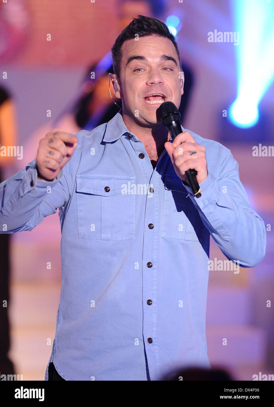 Robbie Williams performing on the television show 'Champs-Elysees ...