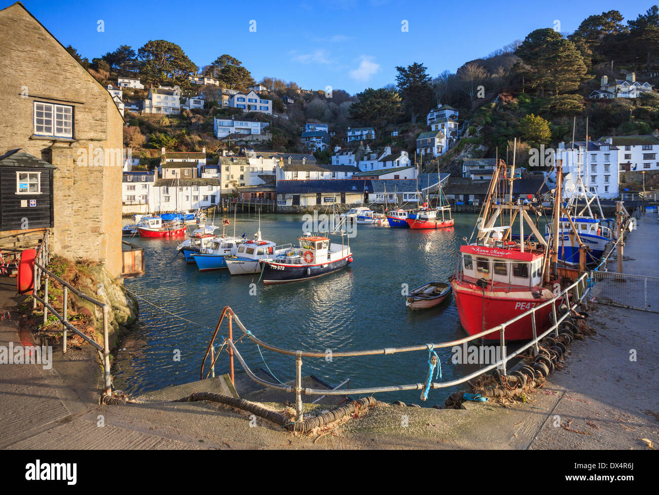 Polperro Harbour in Cornwall captured at high tide Stock Photo - Alamy
