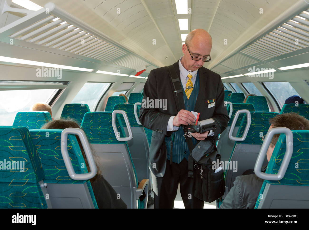 Passenger train conductor hi-res stock photography and images - Alamy