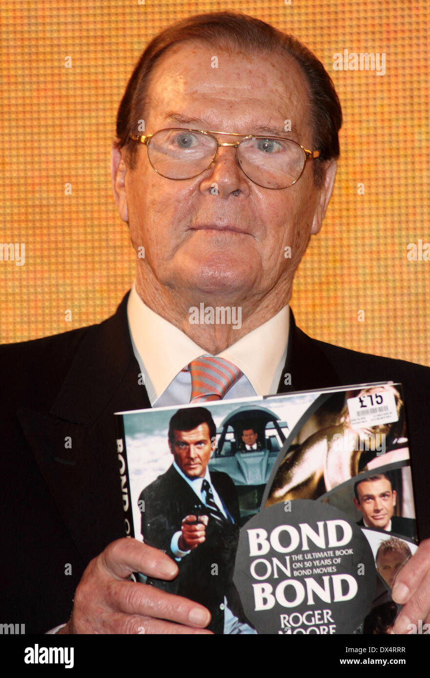 Sir Roger Moore signs copies of his new book 'Bond On Bond' at HMV ...
