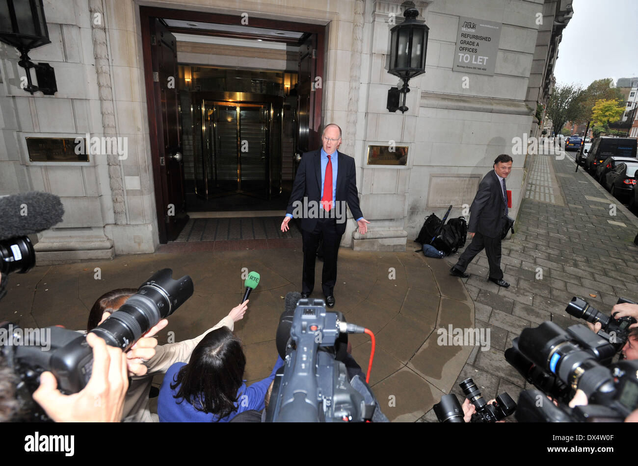 BBC Director General George Entwistle leaves Four Millbank on his way ...