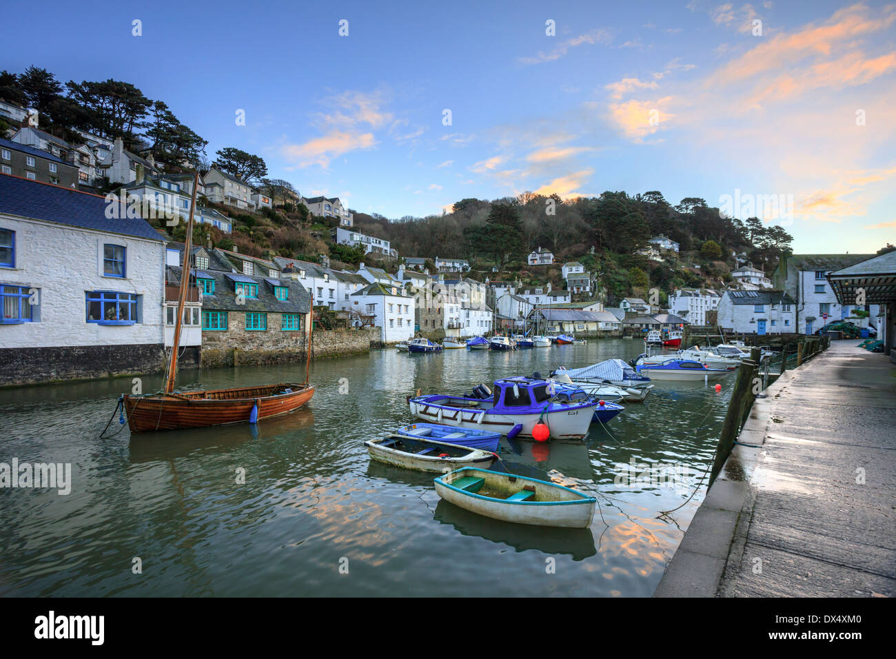 Boats in Polperro Harbour captured at sunrise Stock Photo - Alamy