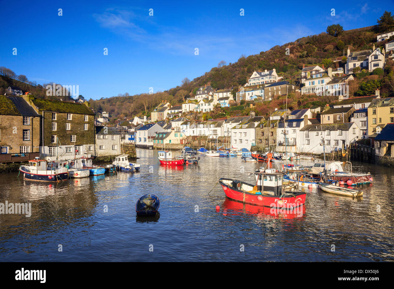 Polperro Harbour in Cornwall captured at high tide Stock Photo - Alamy