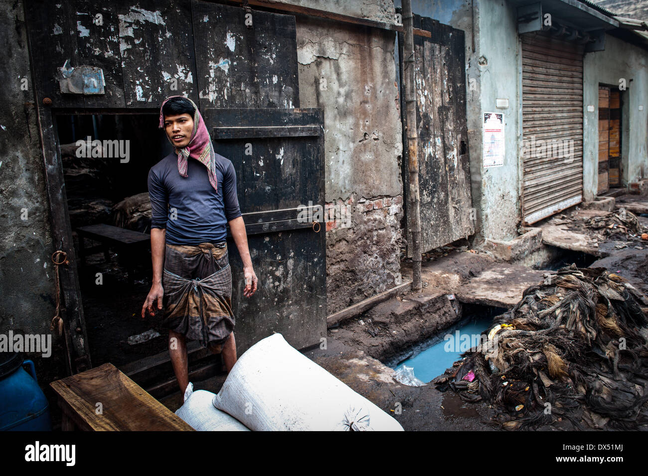 Dhaka, Bangladesh. 7th Jan, 2014. Blue colored dye and chemicals are ...