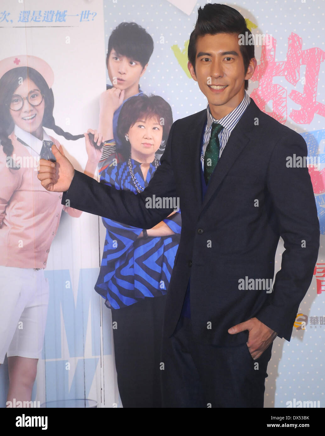 Taipei. 18th Mar, 2014. Actor Hsiu Chieh-Kai poses for photos during ...
