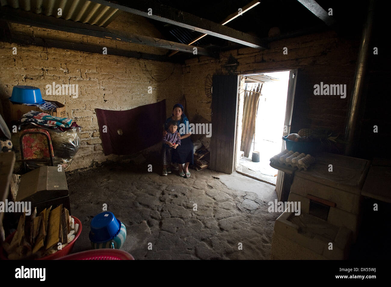 Maya indigenous mother and son in their poorly built one-room-home in ...