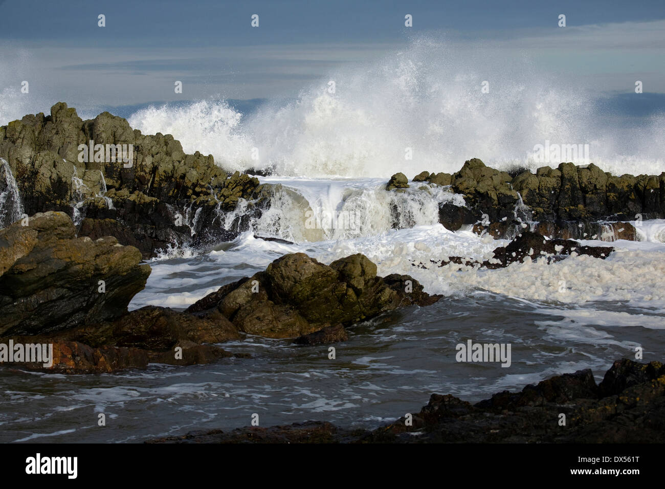 waves over the rocks Stock Photo - Alamy