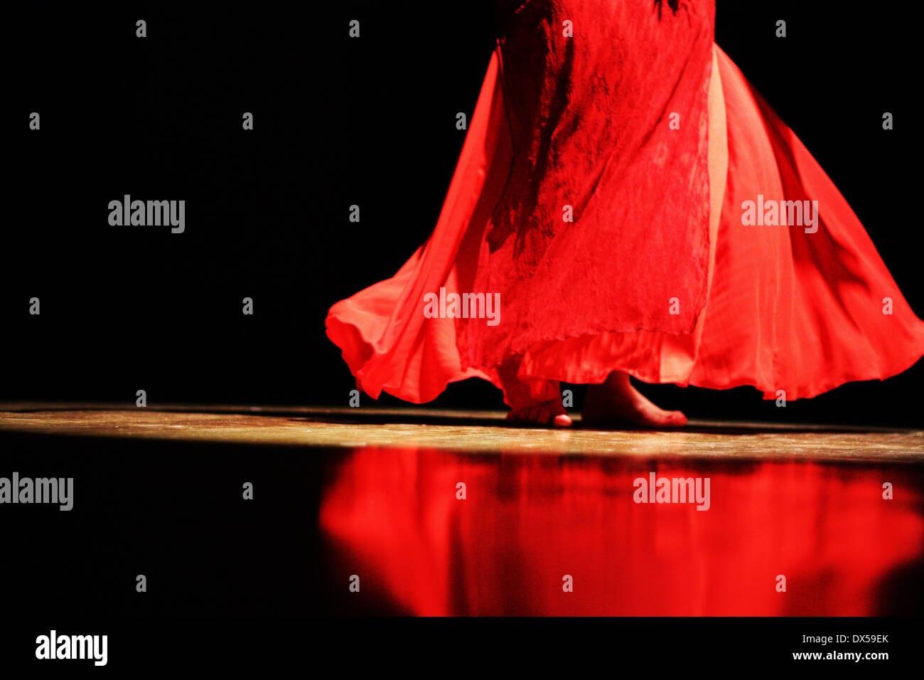Red dress dancing on stage Stock Photo - Alamy