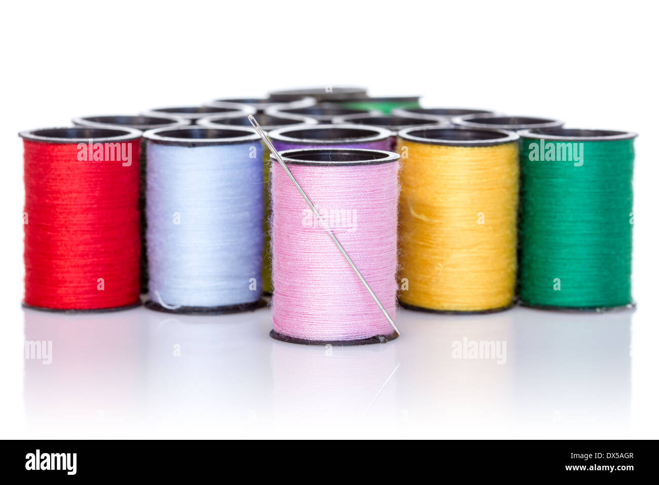 Colorful bobbins with needle, isolated on white background Stock Photo ...