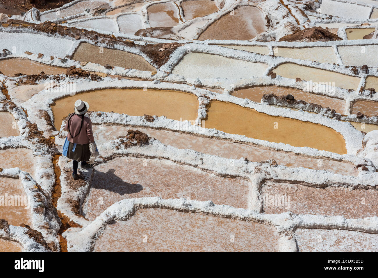 Maras, Peru - July 23, 2013: woman at Maras salt mines in the peruvian ...