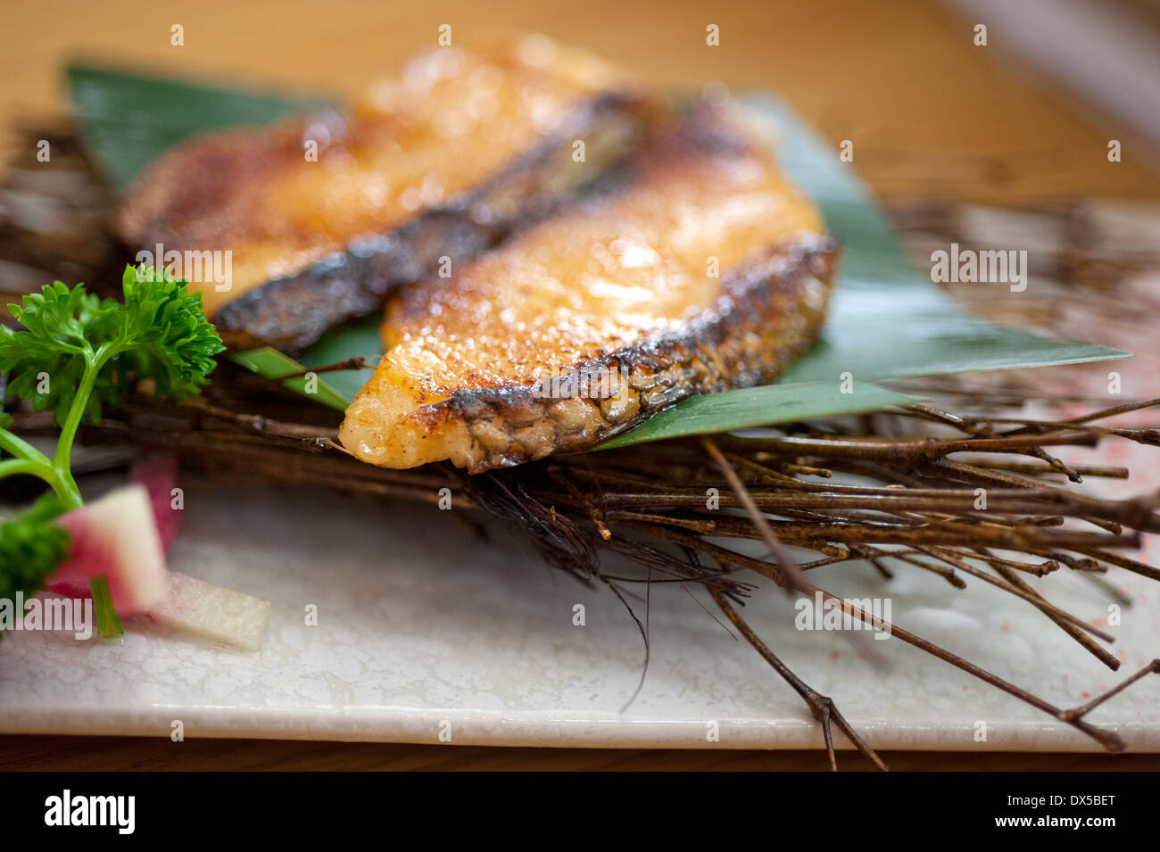 Japanese style teppanyaki roasted cod fish on palm leaf Stock Photo - Alamy