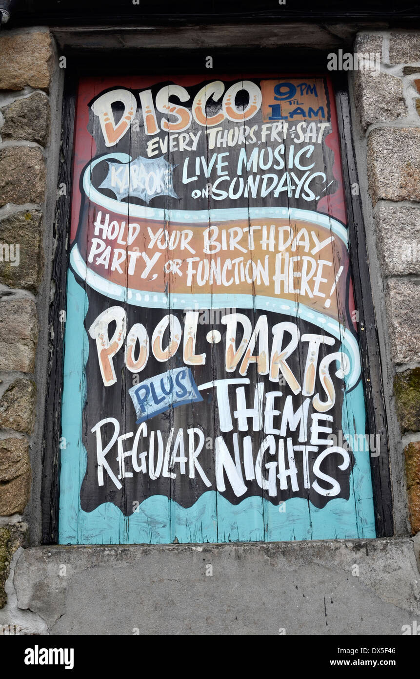 Old painted live entertainment and events sign outside a pub Stock ...