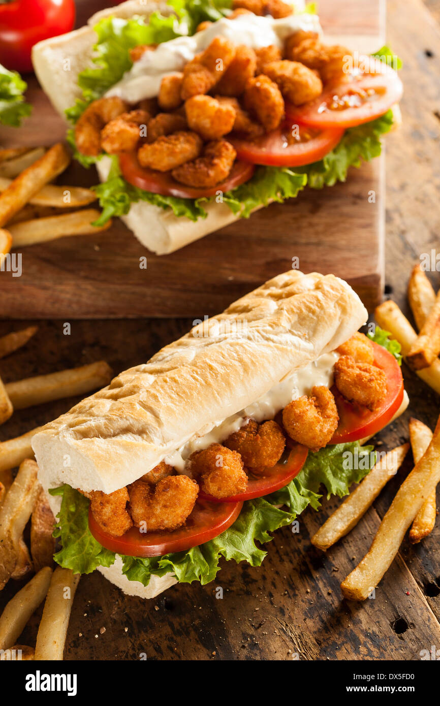 Homemade Shrimp Po Boy Sandwich with French Fries Stock Photo - Alamy