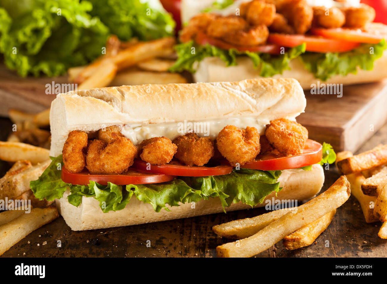 Homemade Shrimp Po Boy Sandwich with French Fries Stock Photo - Alamy