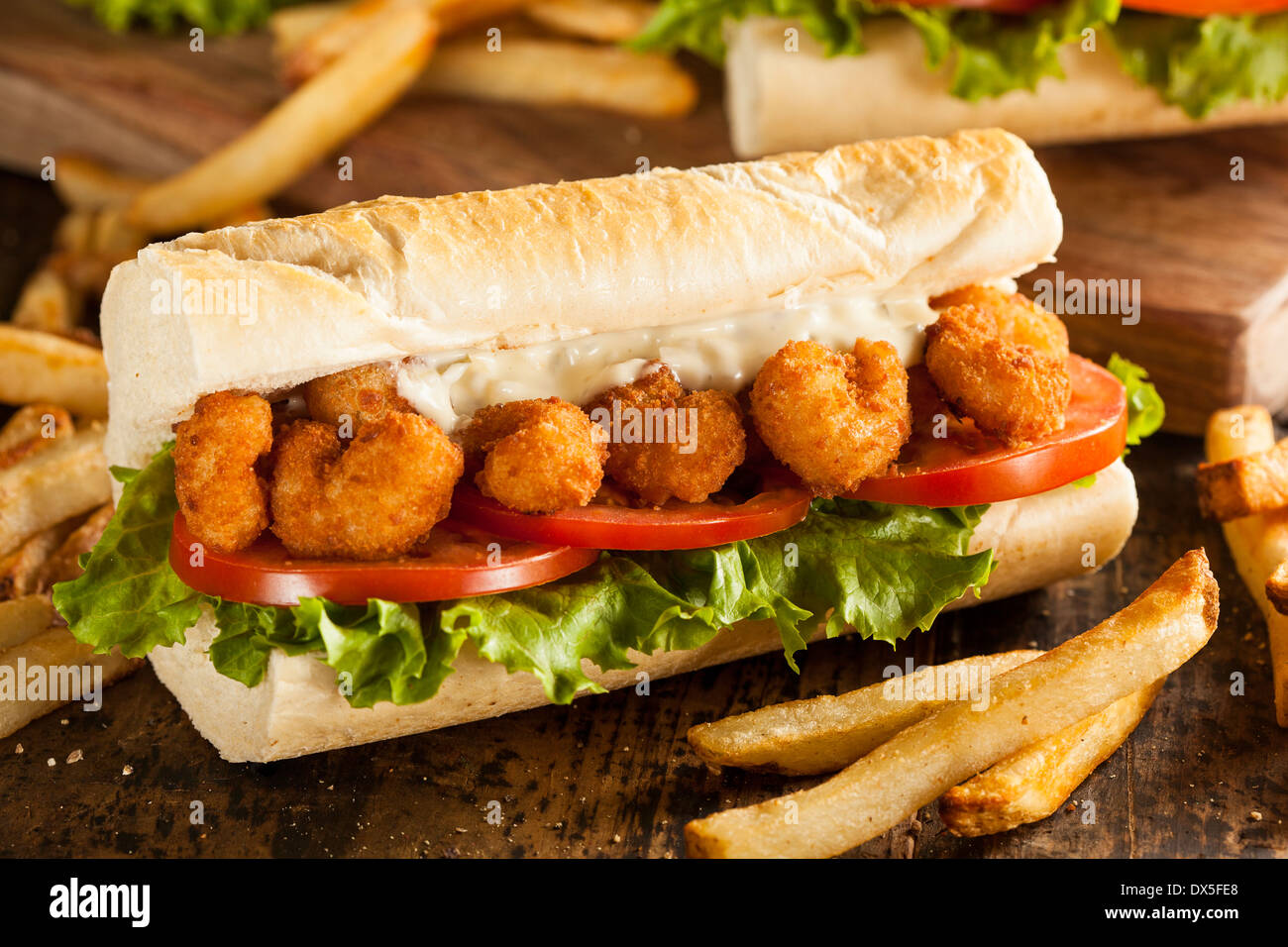 Homemade Shrimp Po Boy Sandwich with French Fries Stock Photo - Alamy
