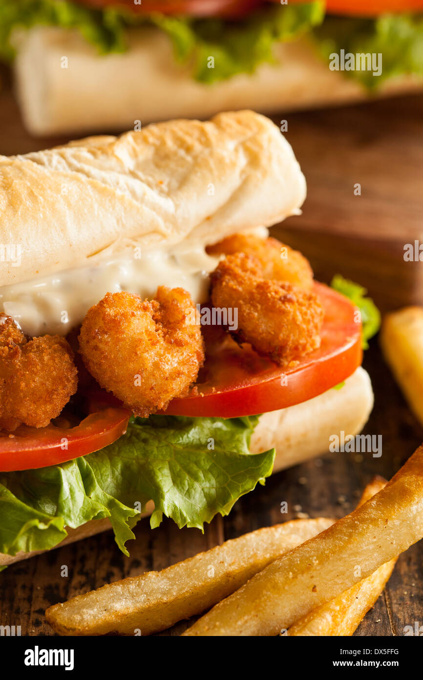 Homemade Shrimp Po Boy Sandwich with French Fries Stock Photo - Alamy
