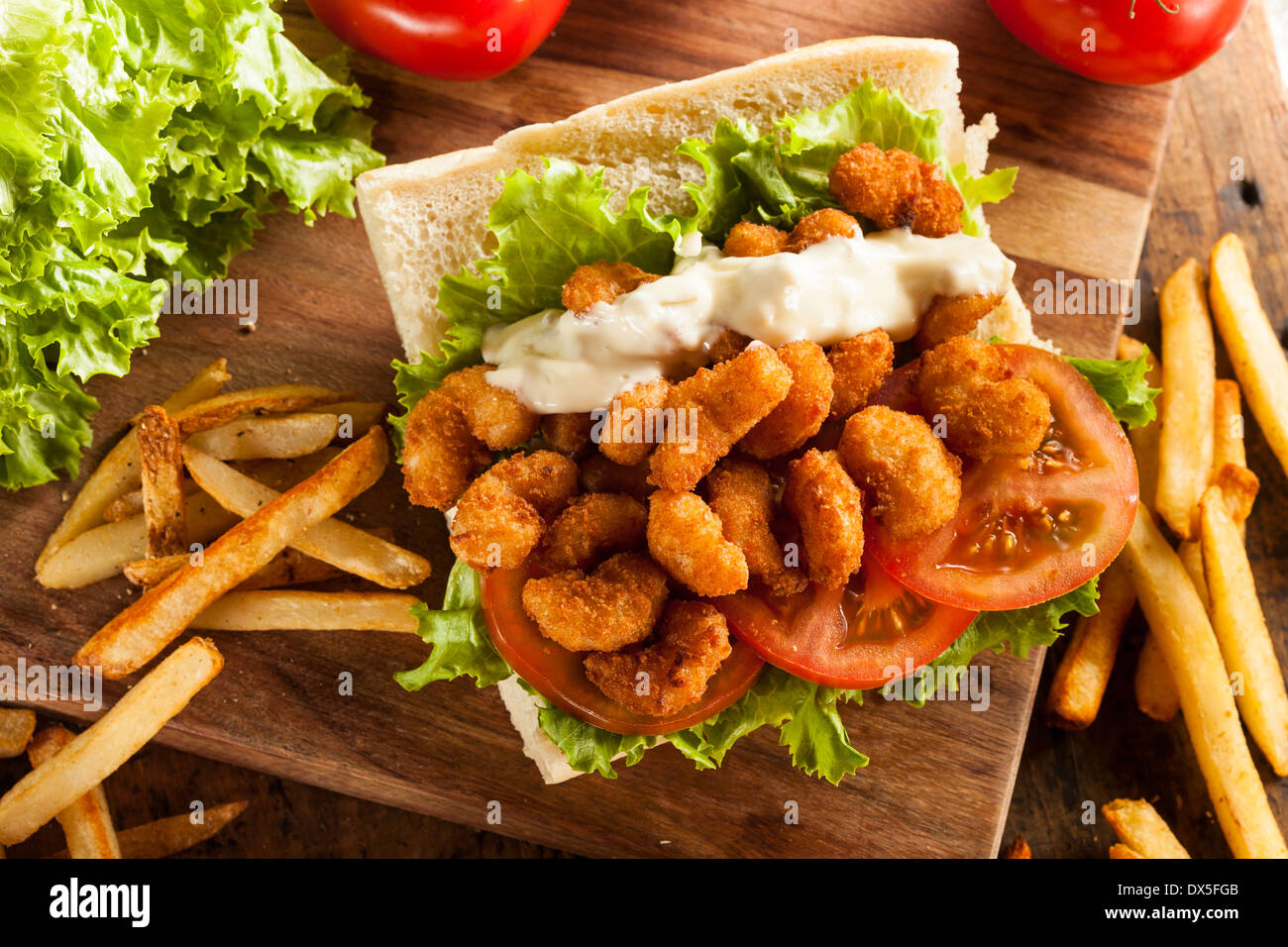 Homemade Shrimp Po Boy Sandwich with French Fries Stock Photo - Alamy