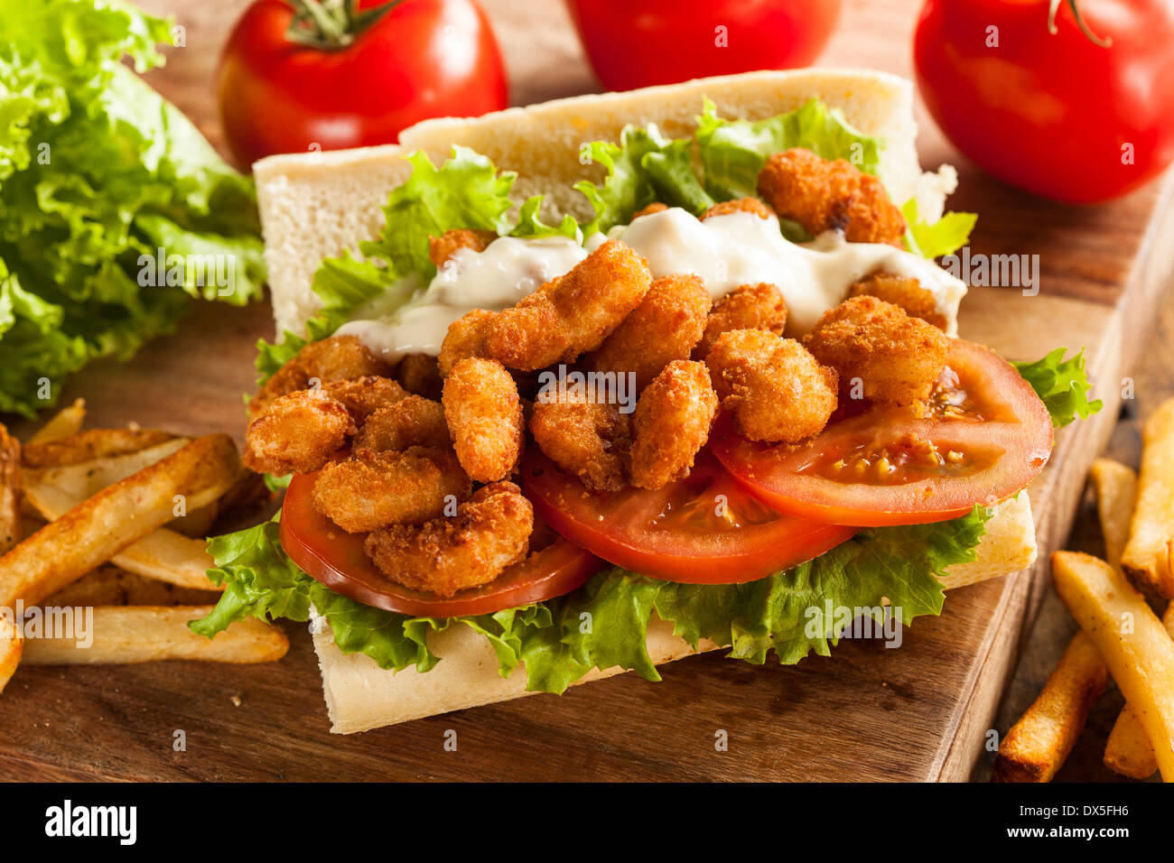 Homemade Shrimp Po Boy Sandwich with French Fries Stock Photo - Alamy