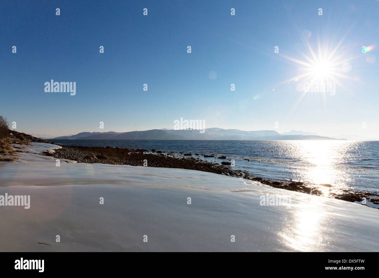 Ice On The Beach Stock Photo - Alamy