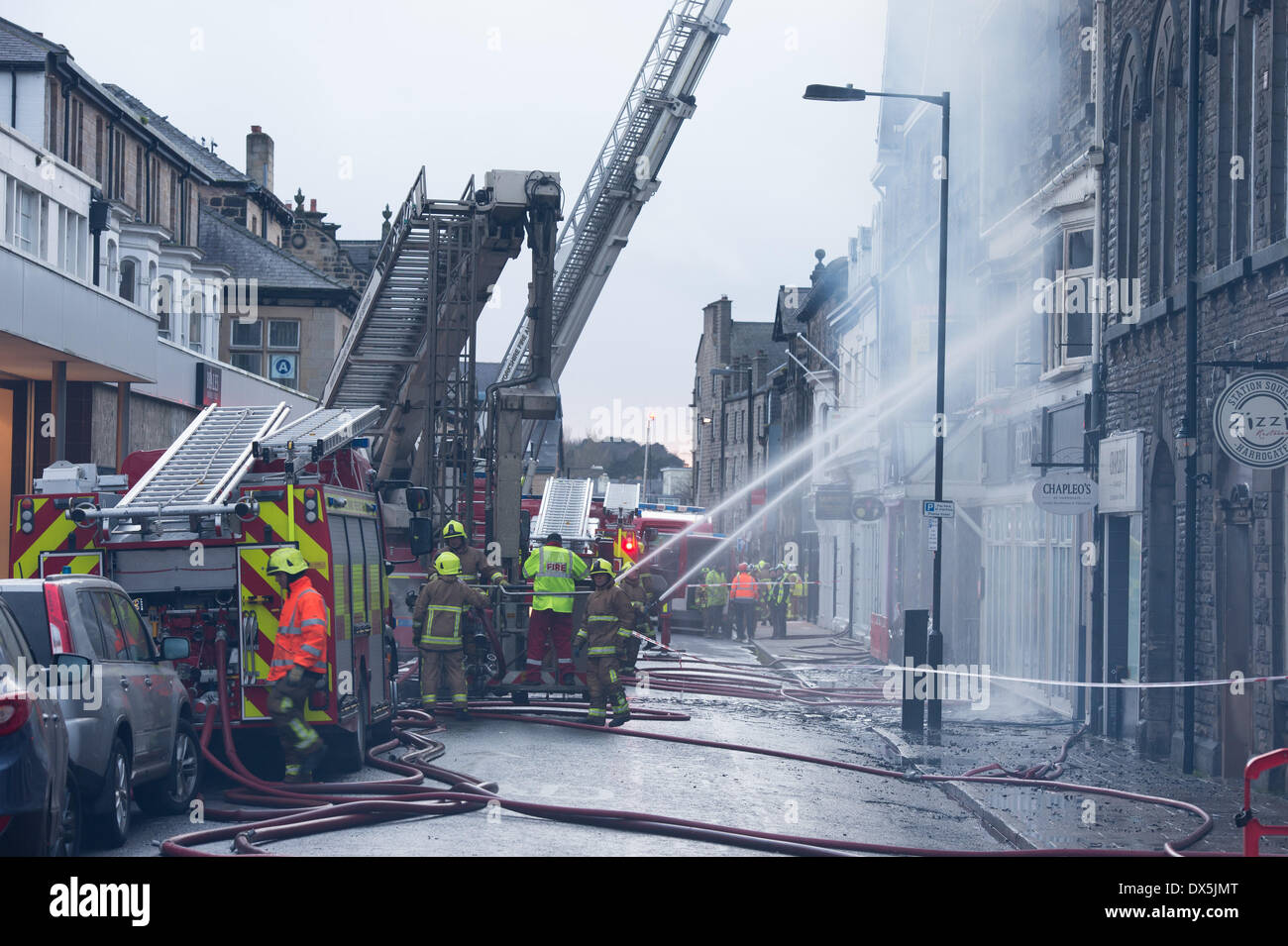 Powerful jets of water from hoses hi-res stock photography and images ...