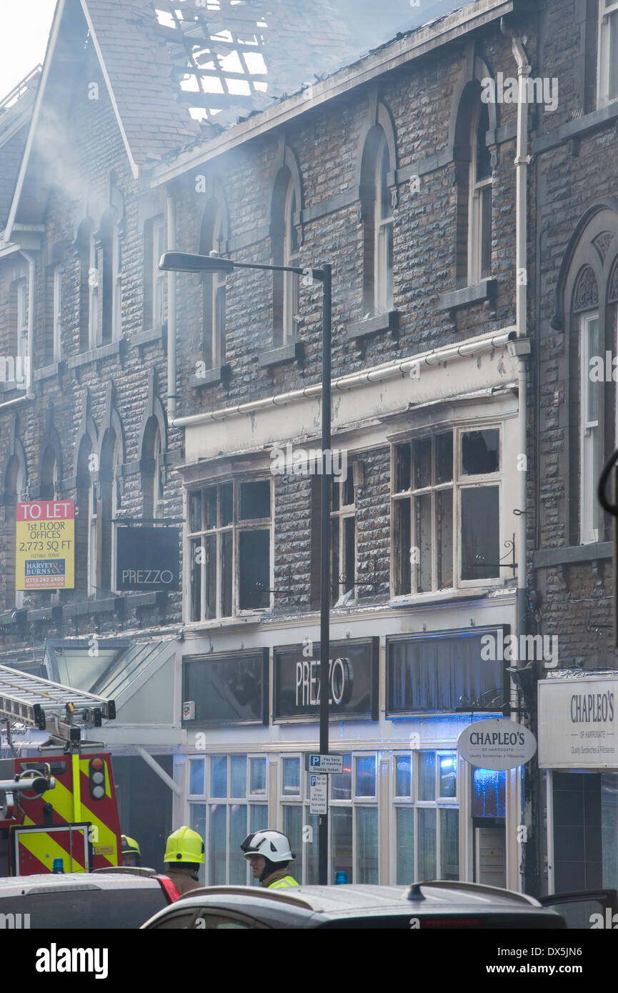 View of a fire-damaged restaurant in Harrogate, with fire crew still in ...