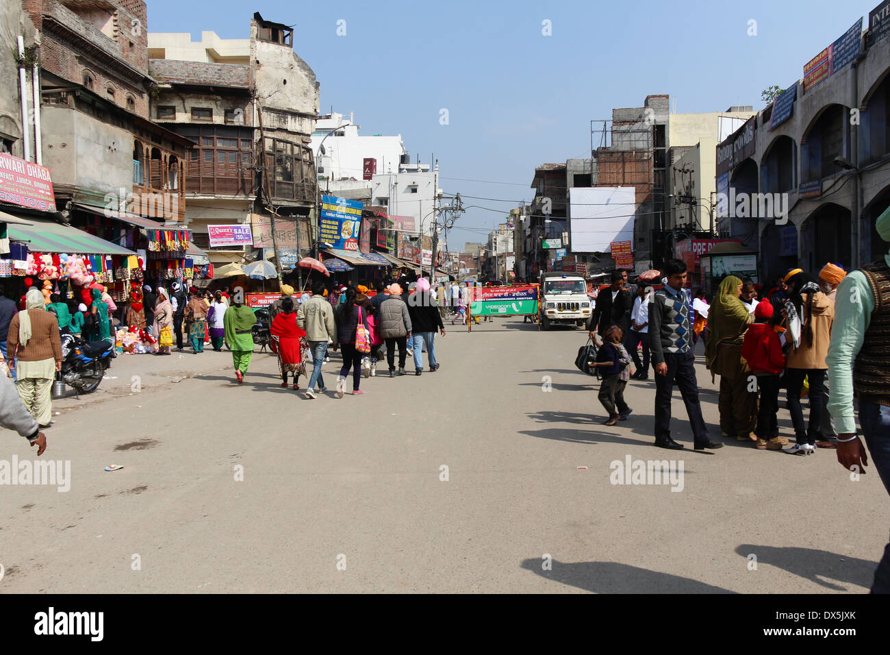 Crowded street and devotees in front of Golden Temple in Amritsar ...