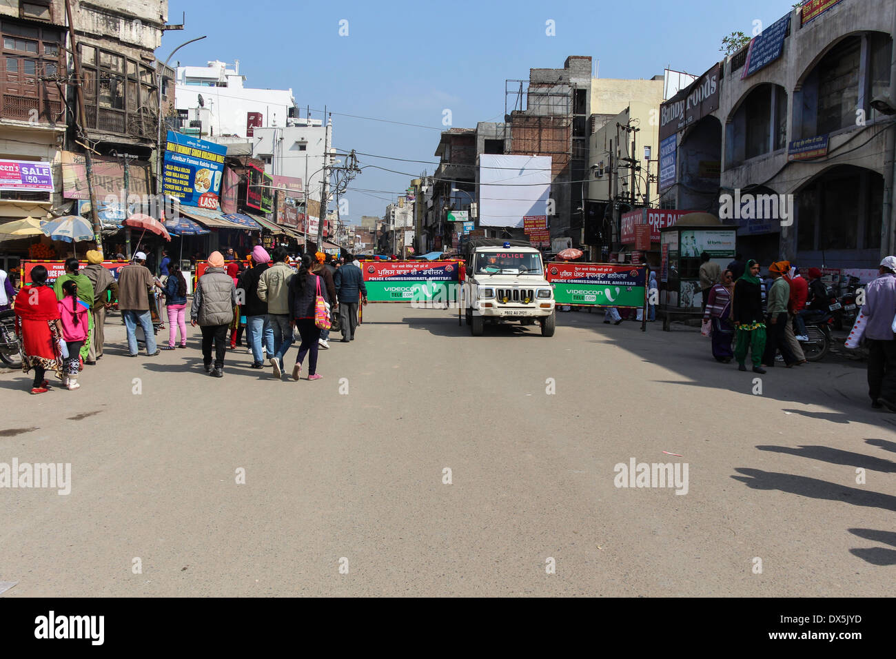 Crowded street and devotees in front of Golden Temple in Amritsar ...