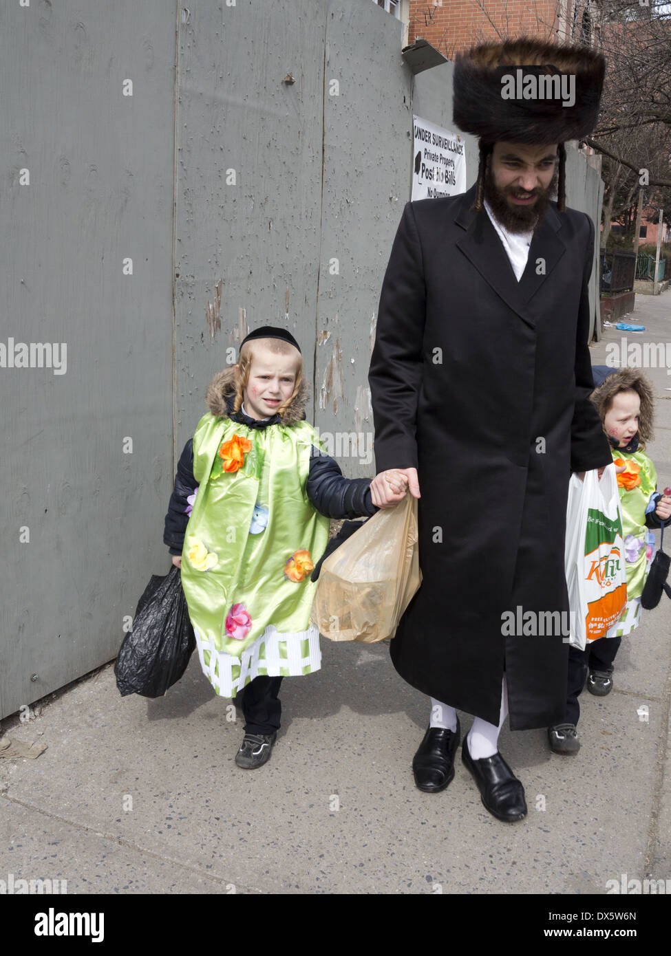 Religious Jews celebrate the holiday of Purim in the Borough Park ...