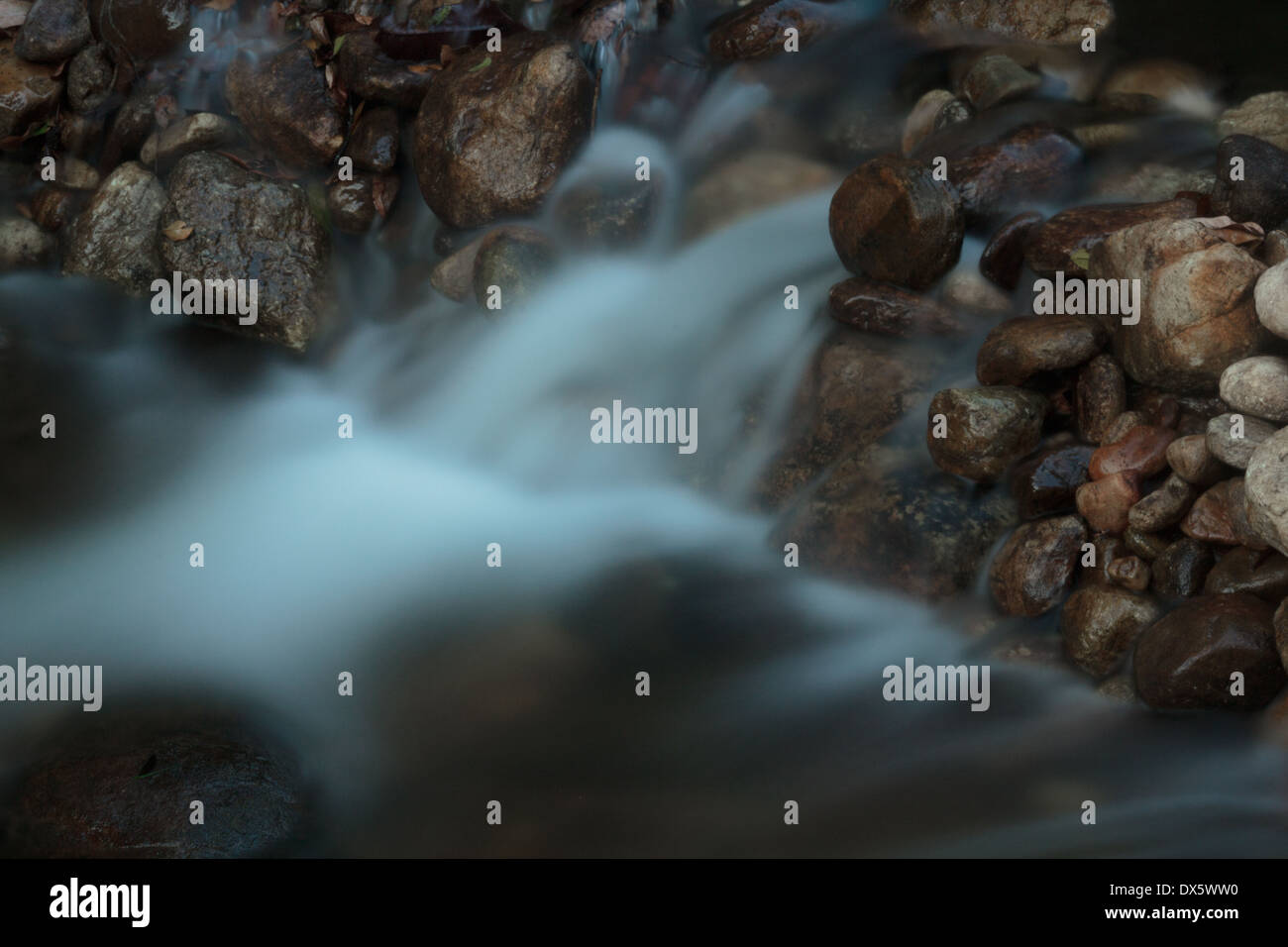 Rushing water through rocks hi-res stock photography and images - Alamy