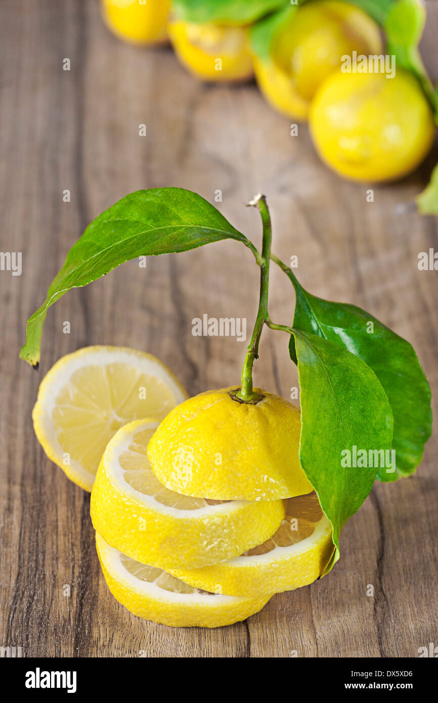 Lemon pieces on table cut hi-res stock photography and images - Alamy
