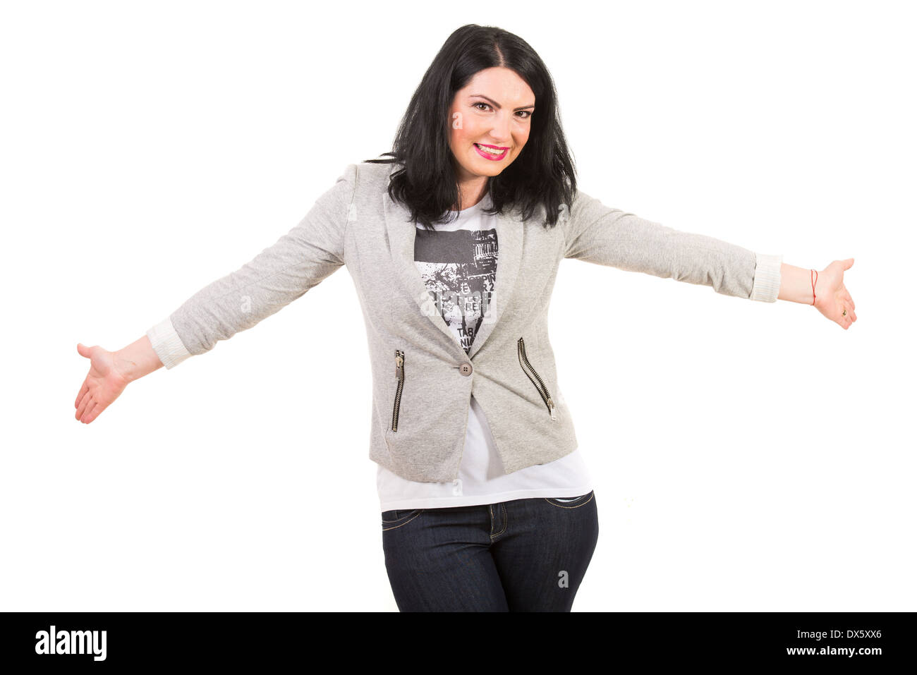 Happy woman in casual clothes posing with open arms isolated on white ...