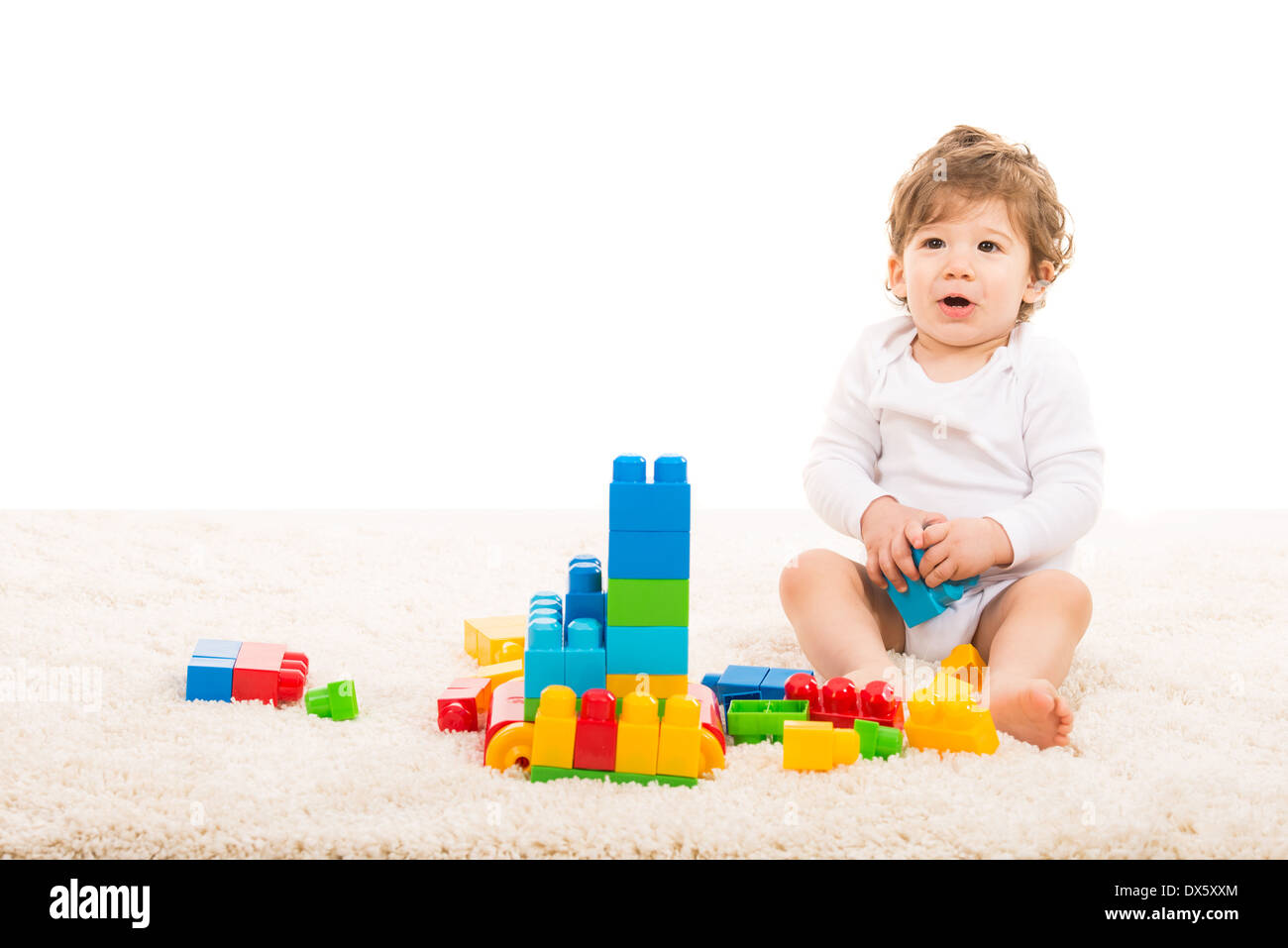 Baby boy stacking blocks hi-res stock photography and images - Alamy