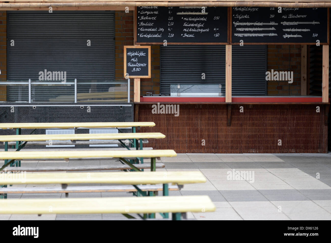 Potsdam, Germany. 17th Mar, 2014. Beer garden benches and tables stand ...