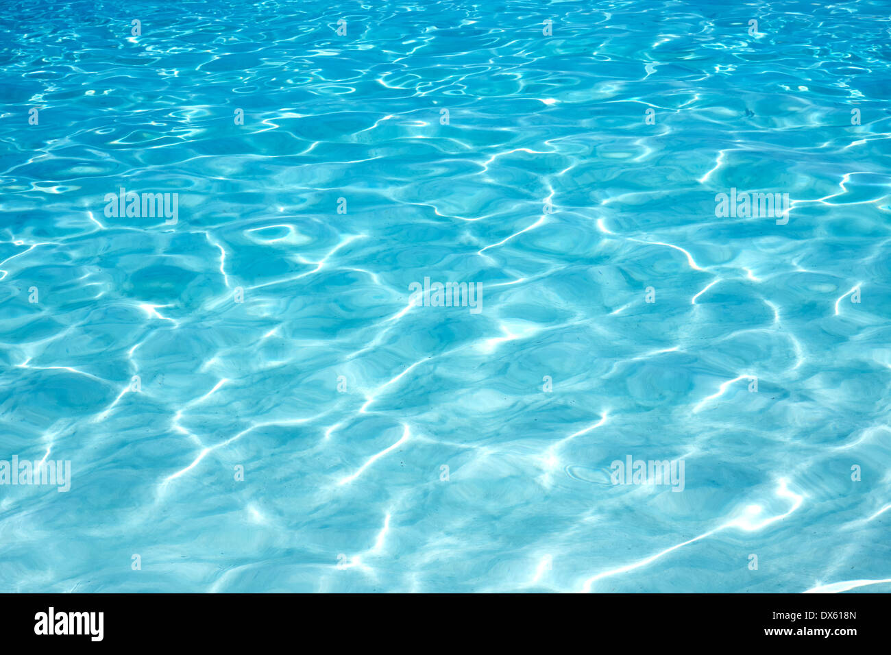 Shining blue water ripple background Stock Photo - Alamy