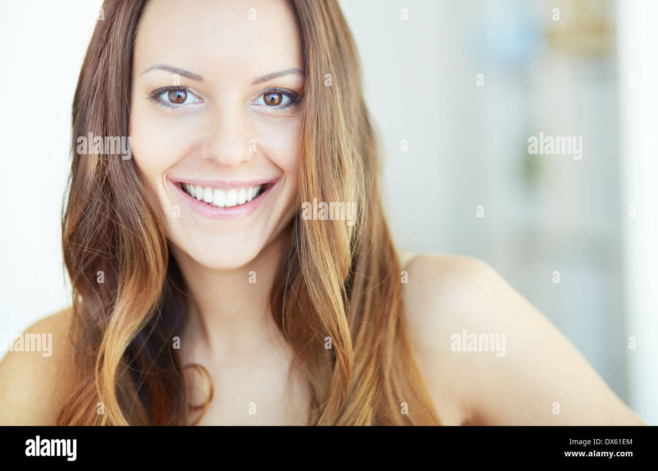 Copy-spaced portrait of a young charming lady looking at camera with ...