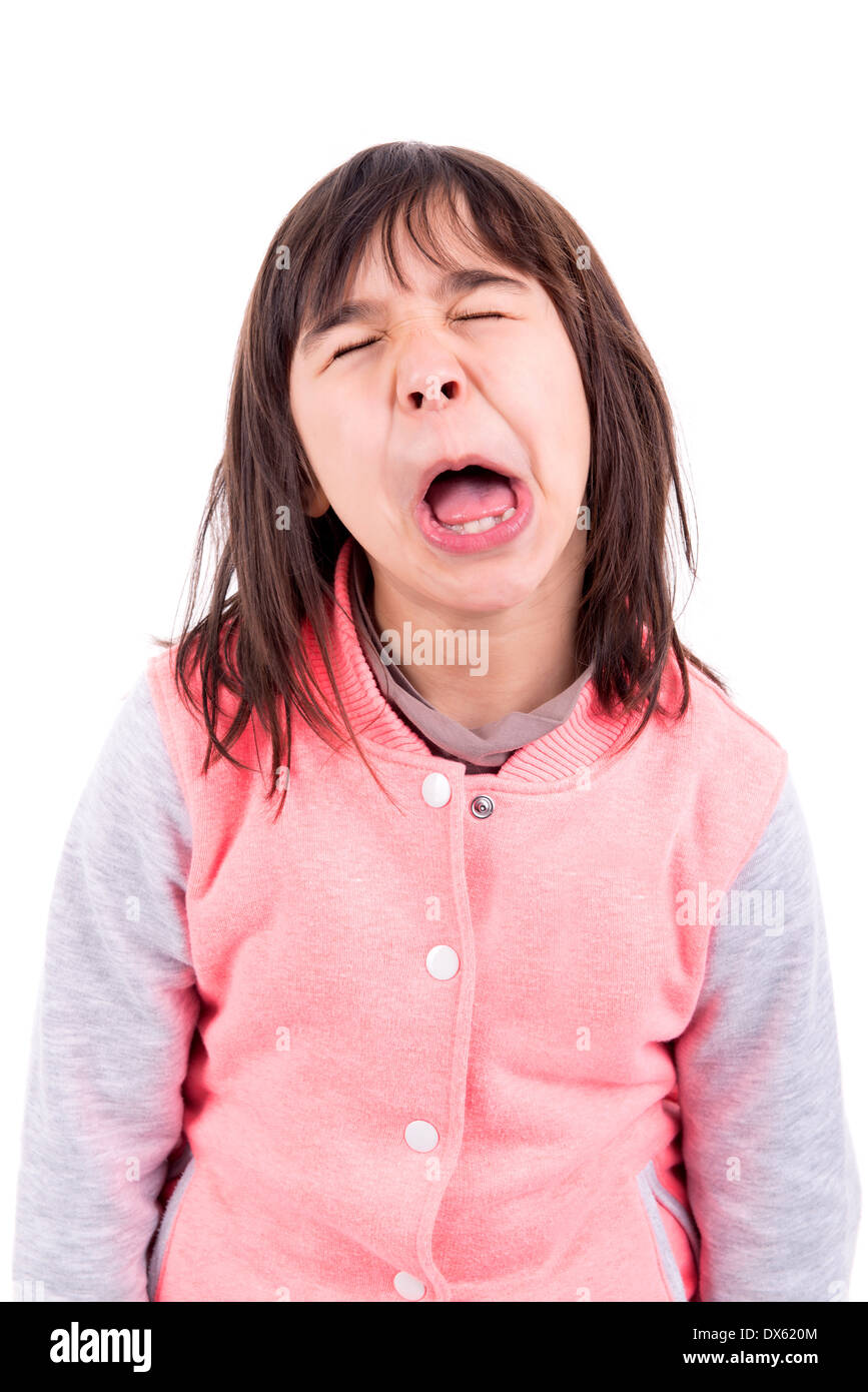 Funny young girl making faces isolated in white Stock Photo - Alamy