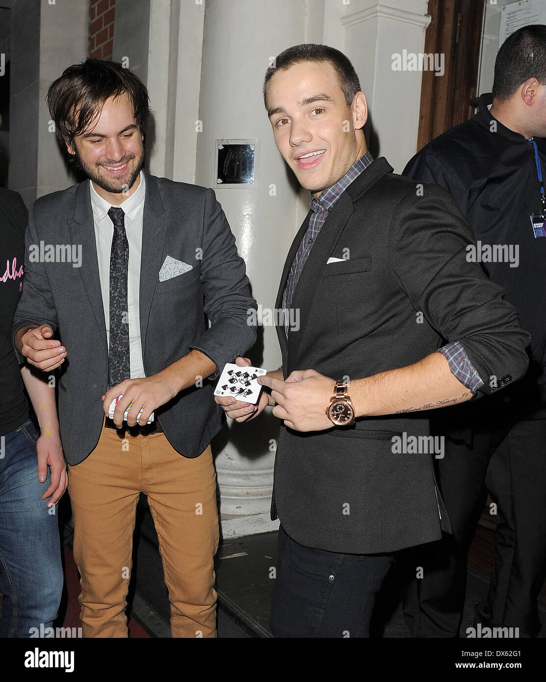 Liam Payne from boyband One Direction, performs magic tricks with some ...