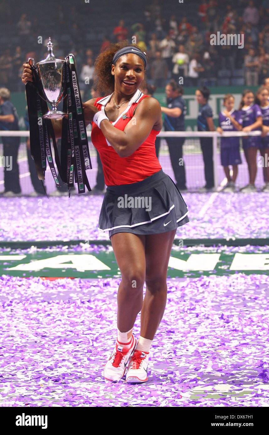 Serena Williams of the United States holds the trophy after beating ...