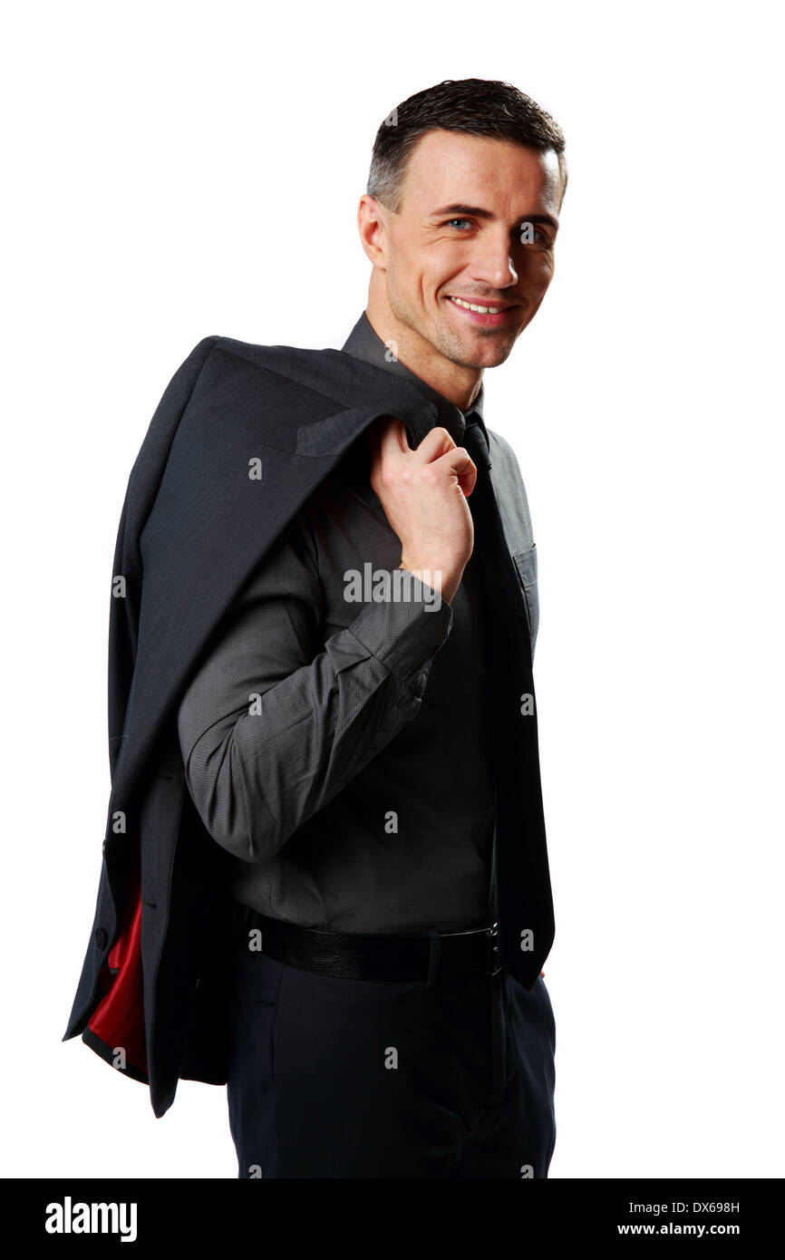 Portrait of a businessman holding jacket over his shoulder isolated on ...