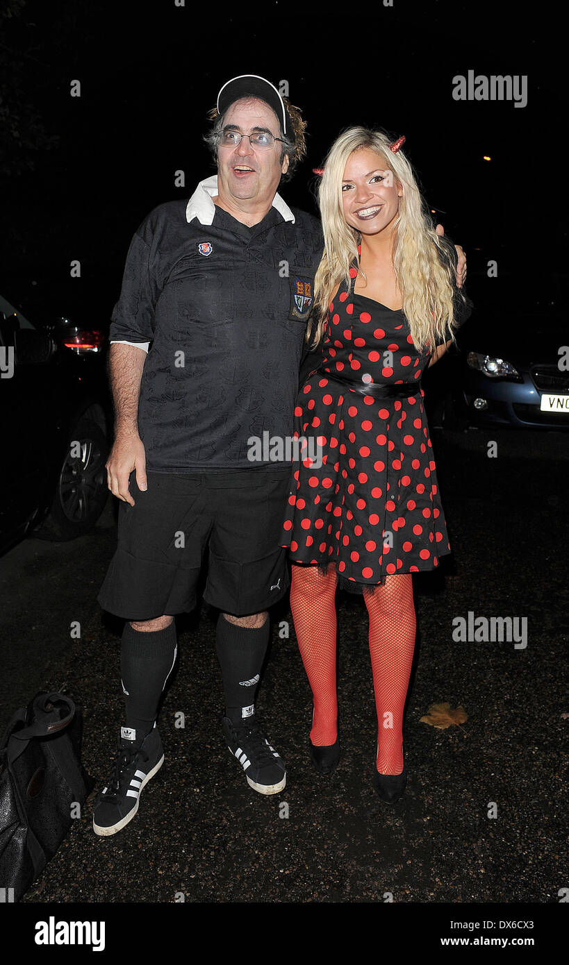 Danny Baker and his daughter leaving a Halloween party held at the home ...